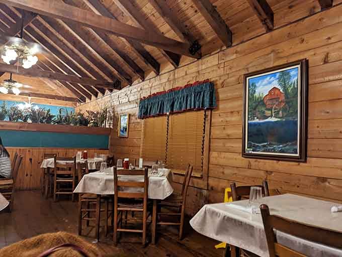 Exposed beams and cozy seating make this dining room feel like the cabin retreat you never knew you needed.