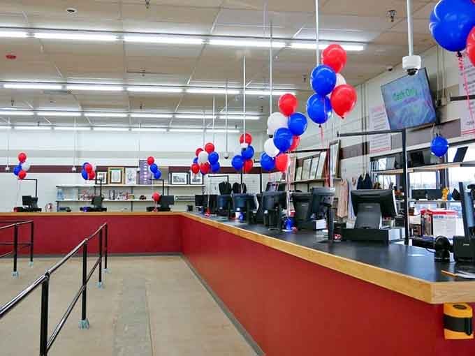 The checkout counter stands ready with festive balloons, because finding deals this good deserves a celebration.