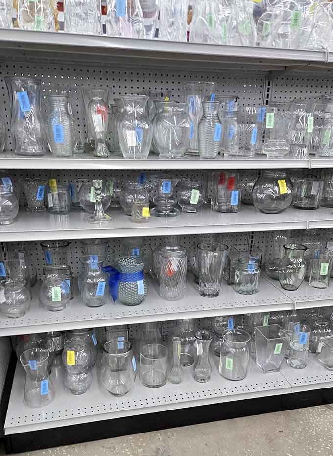 Glassware gleaming on shelves, each piece ready to hold your favorite beverage in secondhand style and savings.