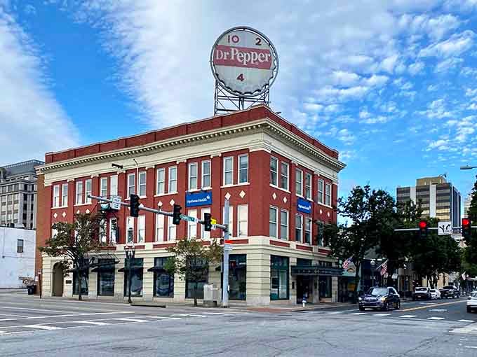 That classic Dr. Pepper sign atop this downtown building is pure Americana, perfectly preserved and proudly displayed.