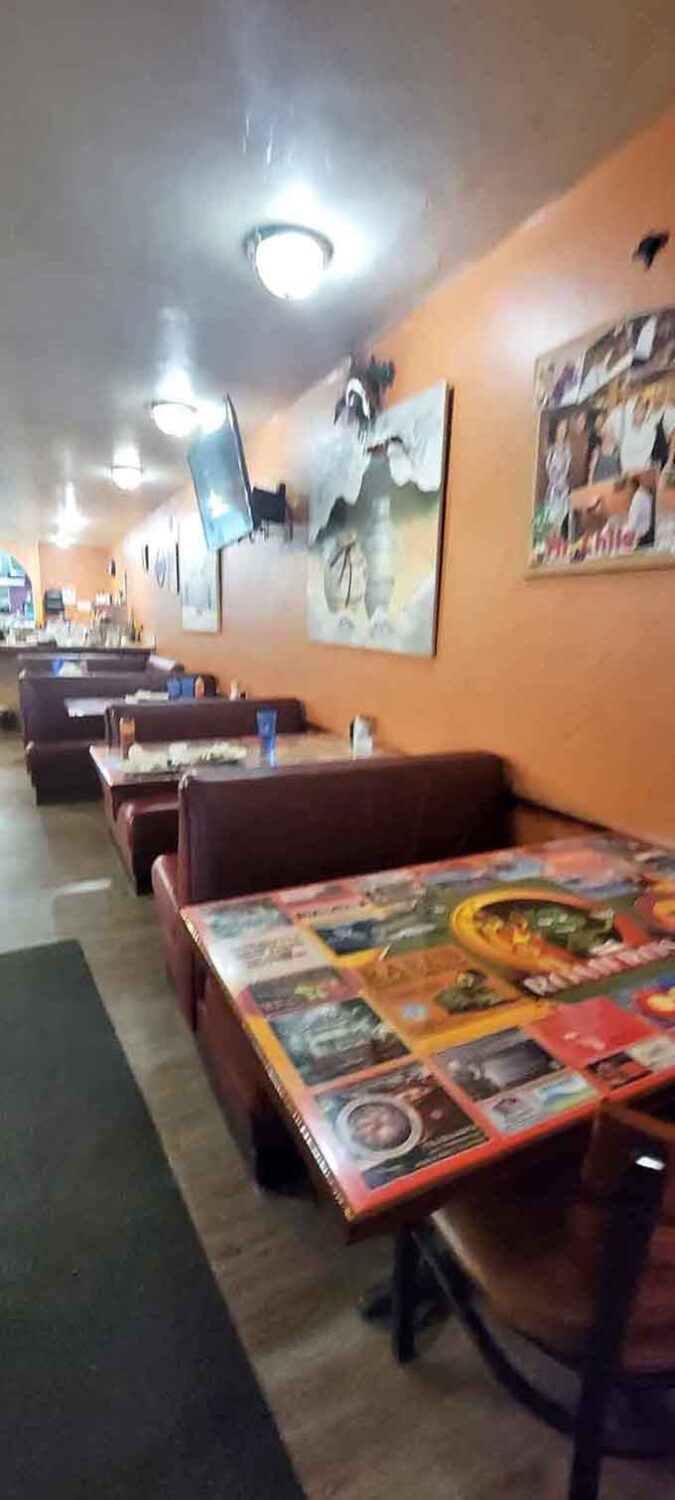 Those booths have seen more green chile consumed than you've had hot dinners, and they're ready for yours.