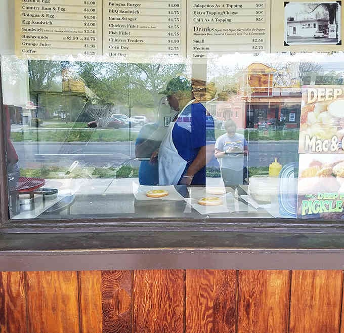 Behind that window, skilled hands work their magic, turning simple ingredients into the stuff of local legend.