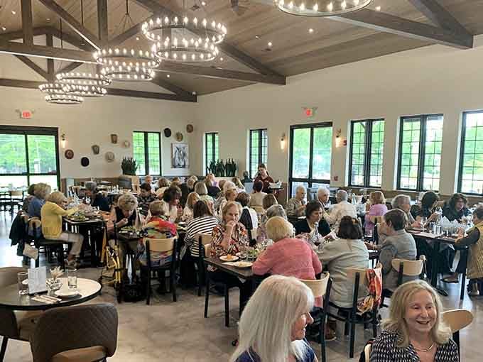A dining room full of happy people enjoying good wine and conversation&mdash;this is what community looks like when it's done right.