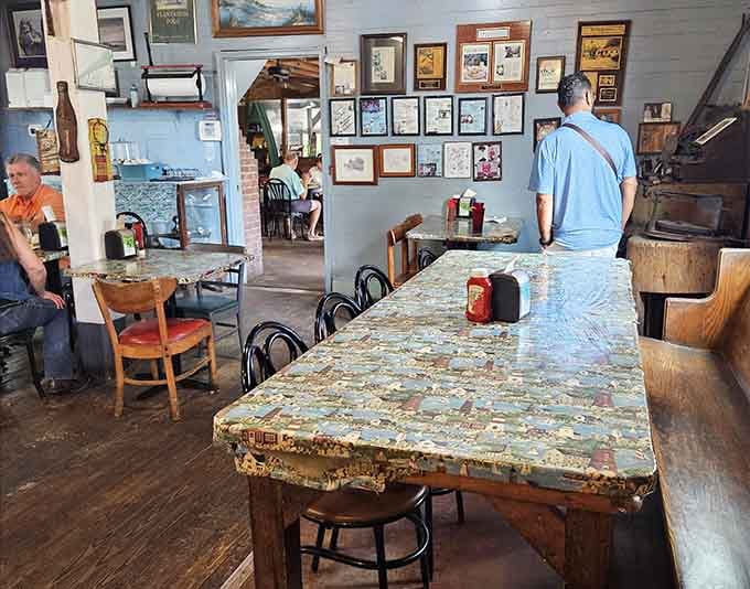 Framed memories and nautical touches line walls that have witnessed decades of satisfied diners.