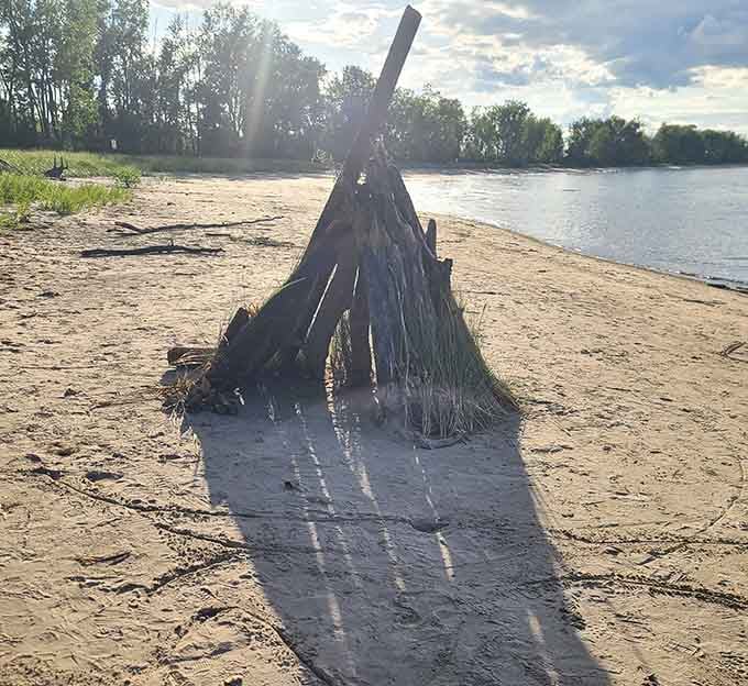 Someone's driftwood creation stands as proof that beachcombing here inspires unexpected bursts of artistic ambition and whimsy.