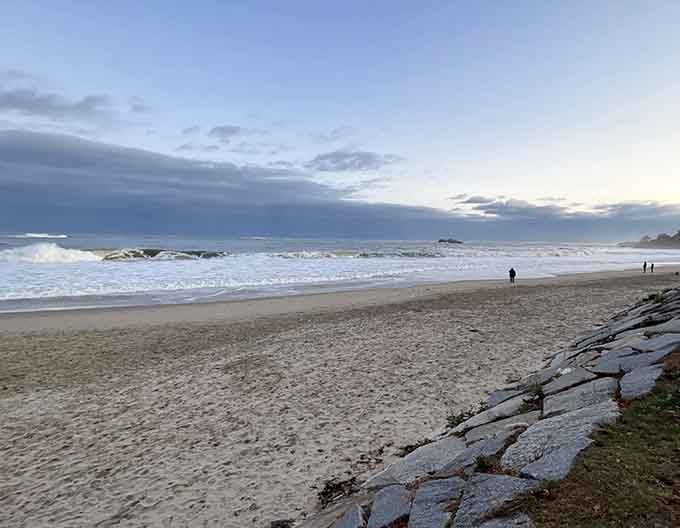 Moody skies and rolling surf remind us that coastal beauty comes in every weather and every season.