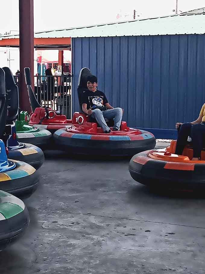 Bumper cars provide entertainment for restless kids while parents continue their serious bargain-hunting mission nearby.