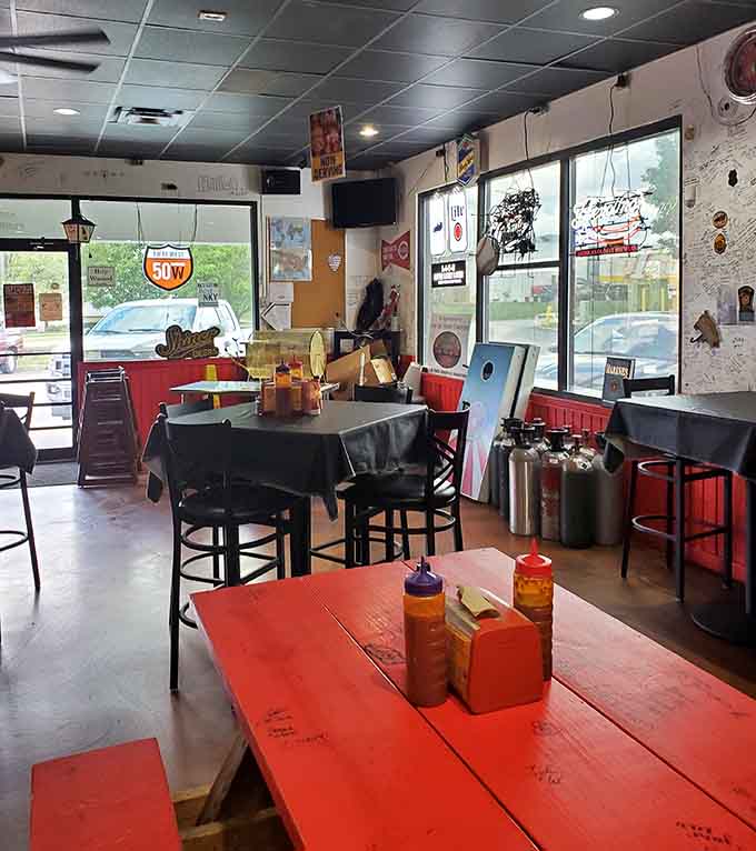 Flight suits on the wall remind you that heroes eat here, and so can you.