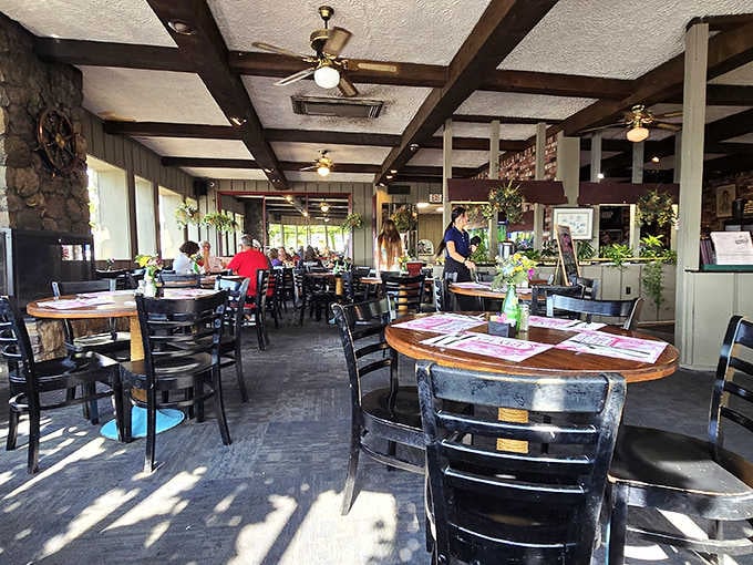 The dining room feels like a cozy nautical retreat where everyone's welcome to pull up a chair.