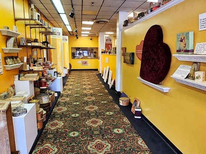 Yellow walls and patterned carpet guide you through chocolate history like a delicious, educational yellow brick road.