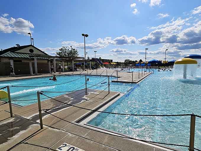 Crystal-clear water reflects the sky while families float, swim, and generally forget about everything beyond these park gates.