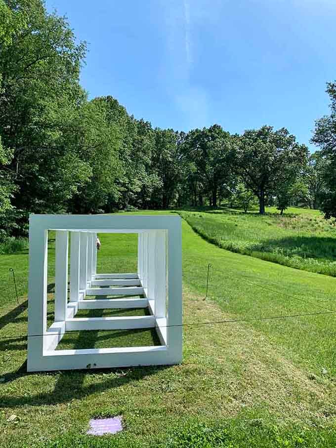 White geometric frames creating windows to nowhere and everywhere, all at the same time somehow.