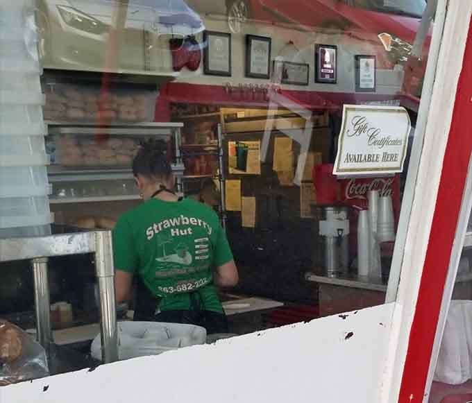 Behind the counter, skilled hands craft sandwiches with the precision of artists creating edible masterpieces daily.