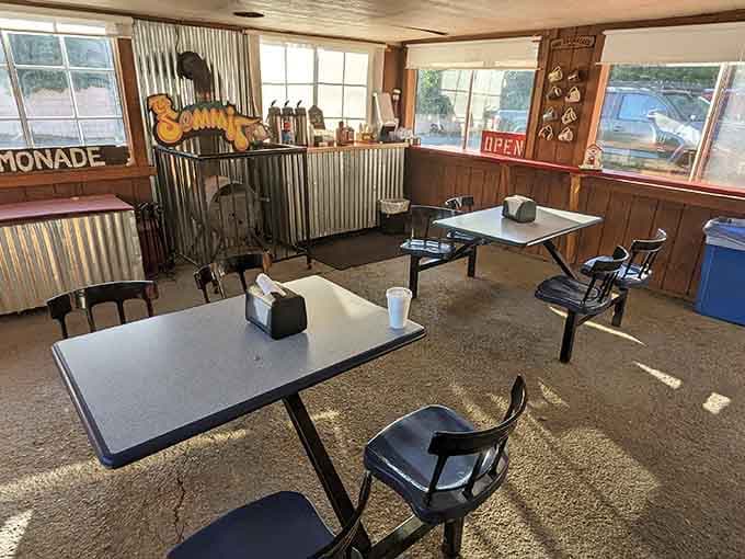 The rustic interior with corrugated metal walls gives you that authentic roadside charm you can't fake or franchise.