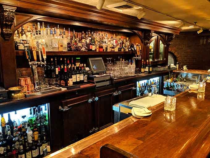 A well-stocked bar with enough bottles to make every evening feel like a special occasion worth celebrating.