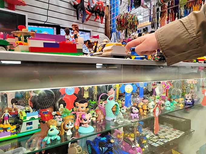 Collectible toys behind glass like a museum of childhood, where nostalgia meets the thrill of discovery.