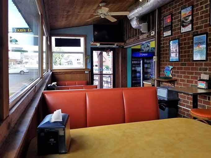 Yellow booths bathed in natural light create the perfect spot for contemplating your excellent lunch choices.