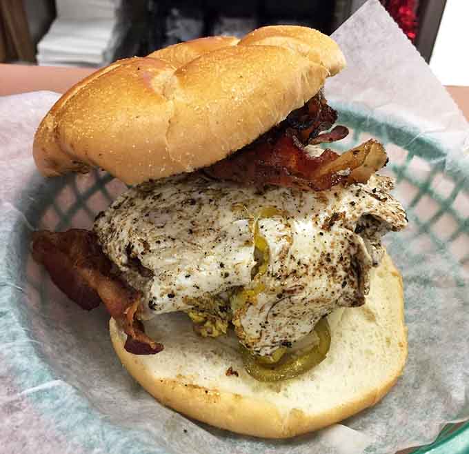 Bacon, a fried egg, and enough pepper to make it interesting, all held together by cheese that's doing serious structural work here.