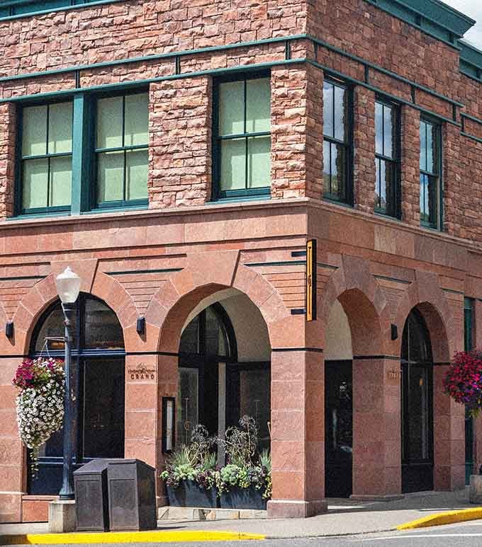 The Grand's red sandstone arches stand elegant, reminding visitors that mining towns built with serious style.