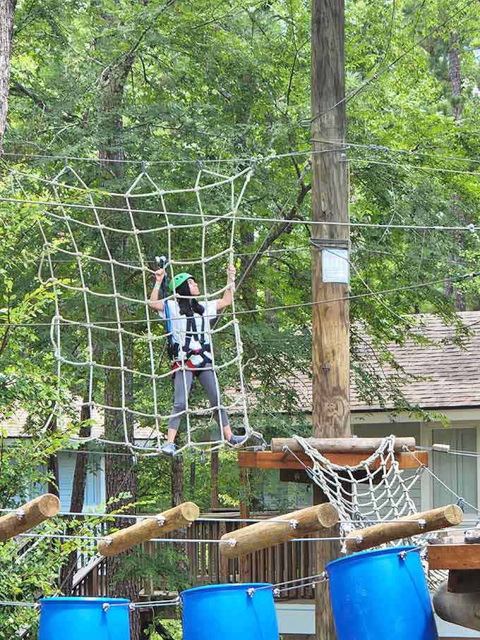 Climbing the cargo net requires determination and grip strength you didn't know you had until this very moment.