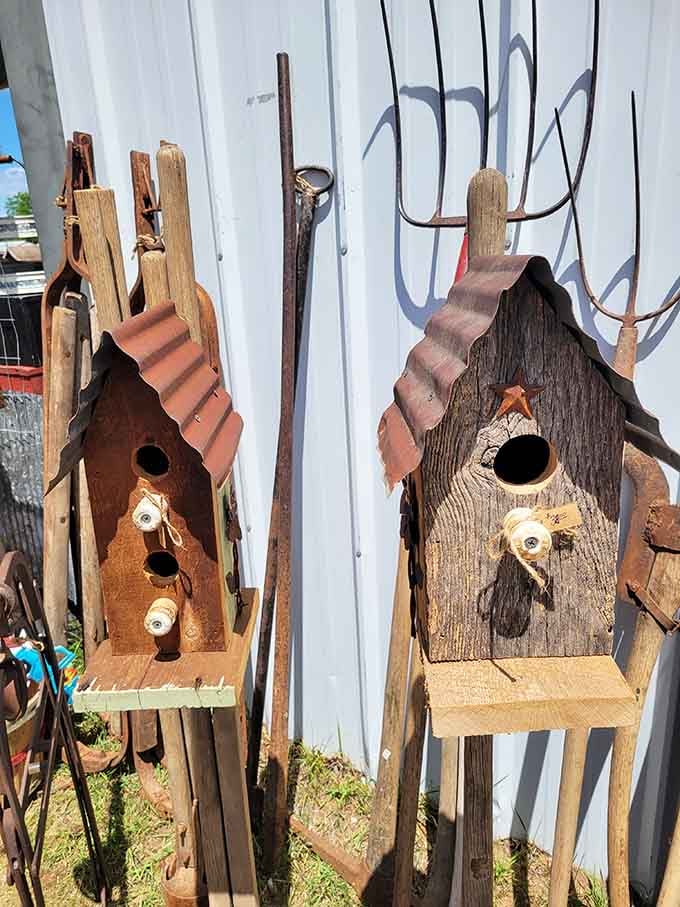 Handcrafted birdhouses with more character than some human houses, complete with copper roofs and rustic charm for discerning feathered tenants.