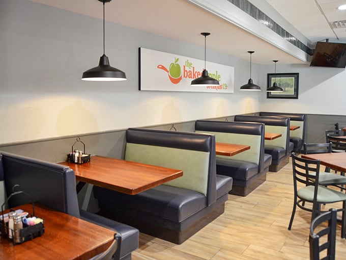 Booth seating with pendant lights overhead: the perfect setup for lingering over that second cup of coffee.