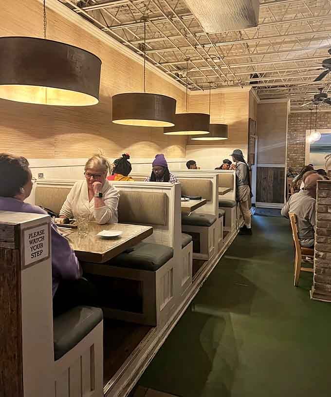 Booth seating with a view means you can people-watch while pretending you're seaside instead of city-side today.