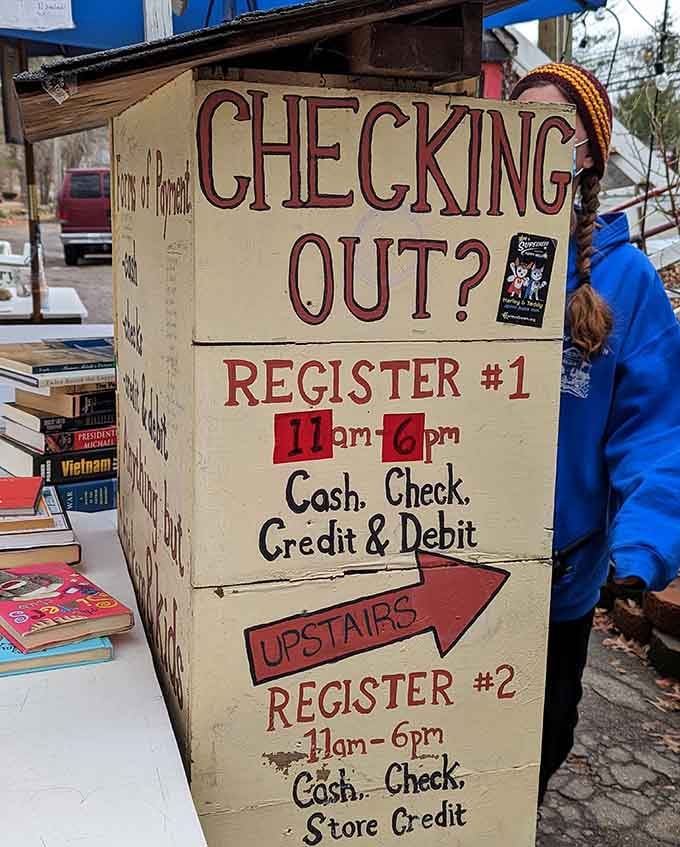 Hand-painted signs guide you through the checkout process with charming inefficiency that somehow works beautifully here.