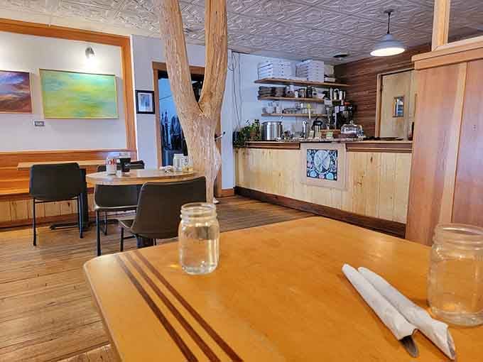 Mason jars, wooden tables, and windows that frame Main Street like a postcard you'd actually want to receive.