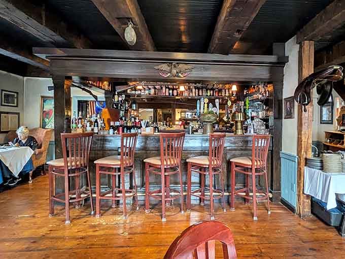 The bar area blends colonial charm with a well-stocked selection, where history meets happy hour in perfect harmony.