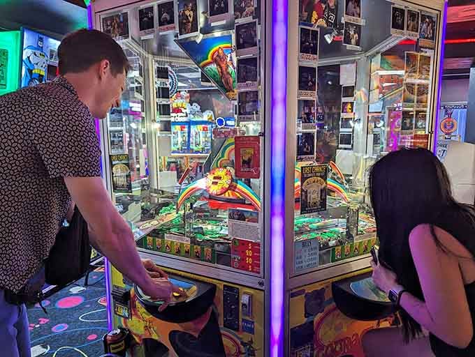 Coin pusher games offering the eternal hope that this time, just maybe, you'll hit the jackpot.