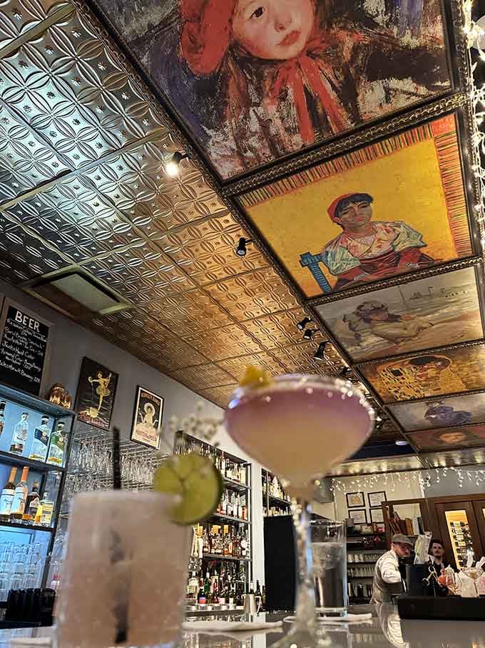 The bar where portraits watch over your cocktails, creating an atmosphere that's equal parts sophisticated and fun.