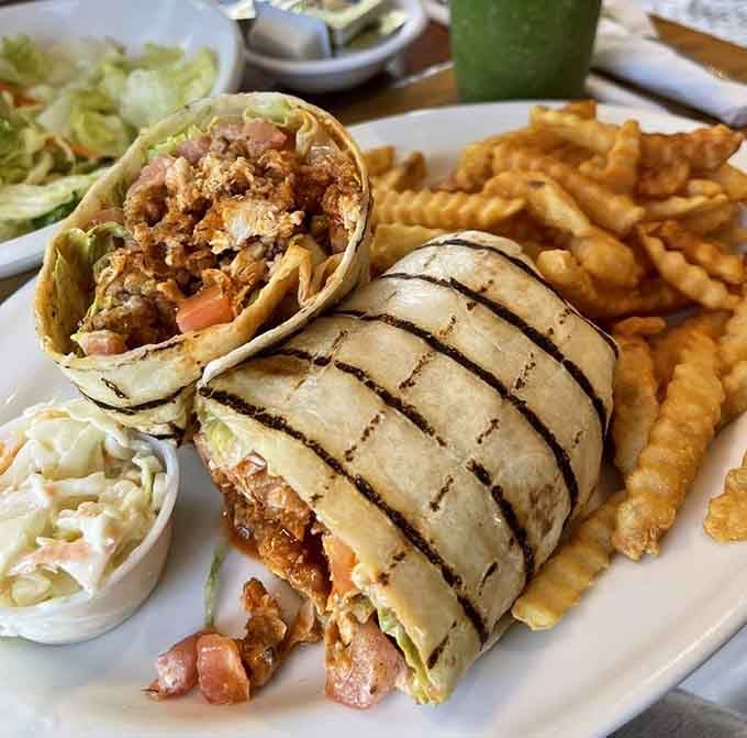 Buffalo chicken wrap comes with enough fries to share, though let's be honest, you probably won't want to at all.
