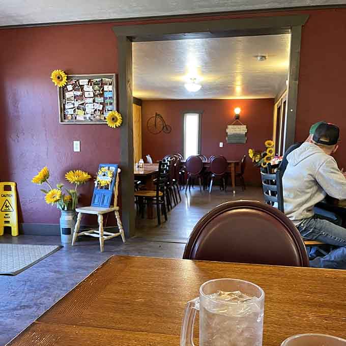 Sunflowers brighten every corner of this cozy cafe, adding pops of sunshine to an already cheerful space designed for lingering over breakfast.