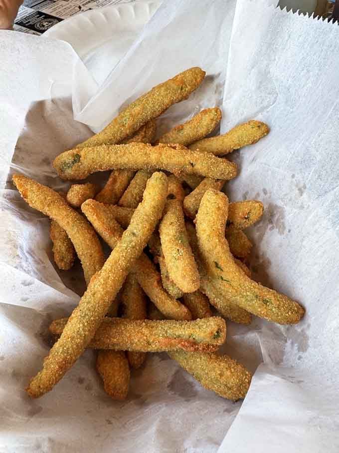 Fried green beans proving that vegetables taste better when they're golden, crispy, and slightly indulgent.