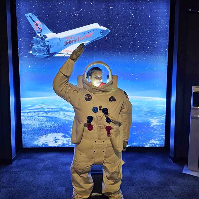 Suit up as an astronaut against a space shuttle backdrop, because who hasn't dreamed of floating among the stars?