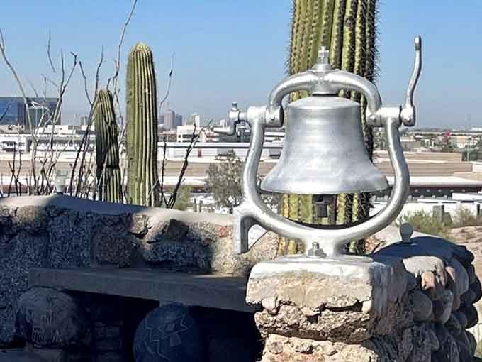 A train bell perched on the property hints at Phoenix's railroad past and the castle's quirky history.