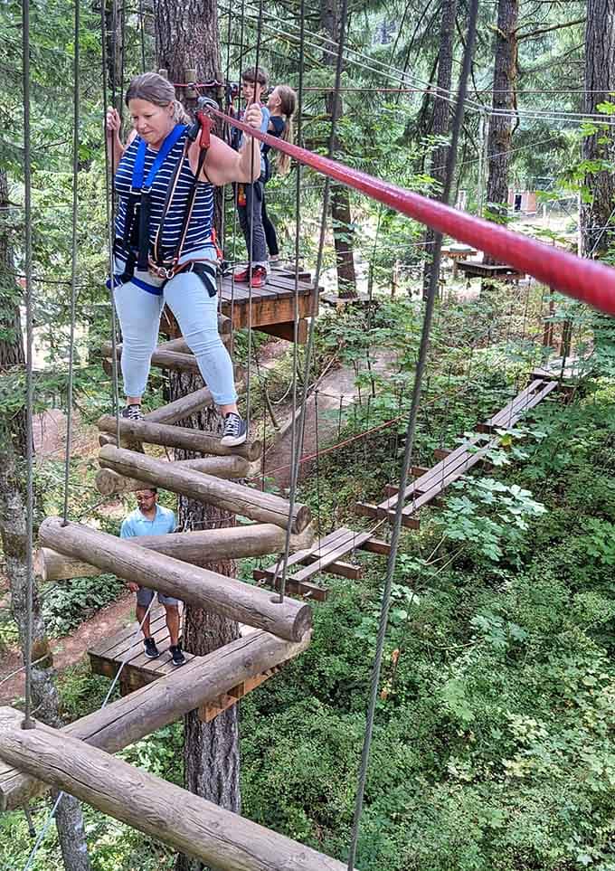 Zigzagging logs create a puzzle of balance and nerve, challenging adventurers to find their inner acrobat or at least fake it.
