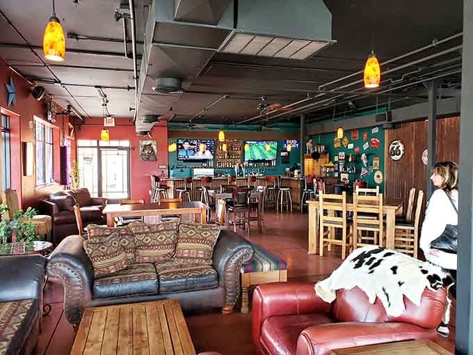 Eclectic lounge vibes with cowhide throws and vintage signs create the Southwest's coolest hangout spot.