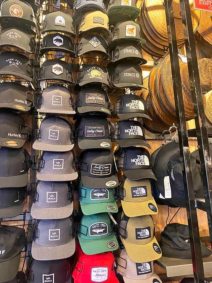 Baseball caps stacked higher than your expectations, covering every brand and style your head could desire.
