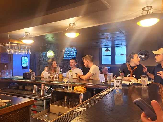 Happy diners enjoying generous portions at the bar, which is exactly what a great pub should deliver.