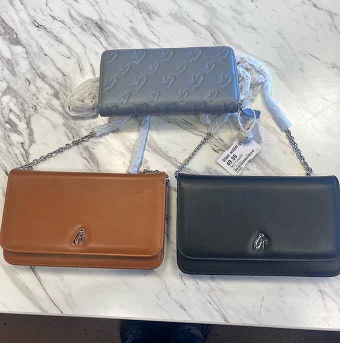Wallets and clutches that look boutique-worthy, priced like they're actually meant to hold money instead of drain it.