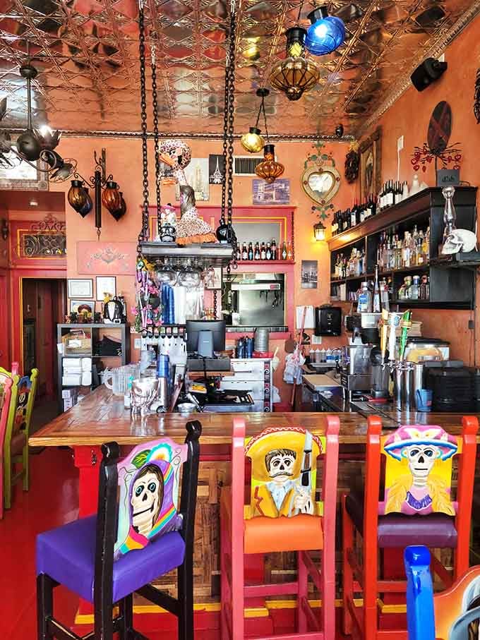 The bar area decorated with enough colorful charm to make every drink taste better and every conversation more interesting than usual.