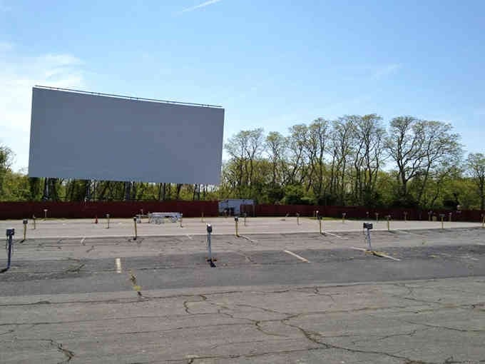 This peaceful scene will soon transform into a bustling hub of families, popcorn, and cinematic joy.