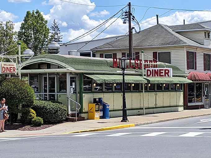 Classic diner architecture that looks like it rolled straight out of 1952 and decided to stay forever.