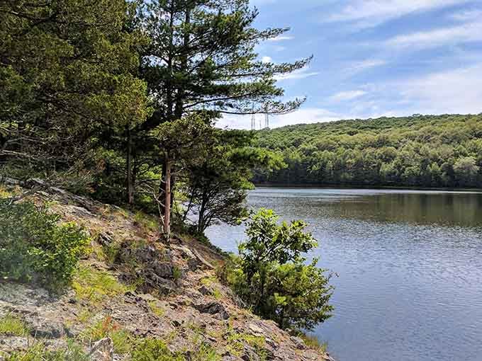 Lake Wintergreen reflects the ridge above, doubling the beauty and your photo opportunities in one peaceful spot.