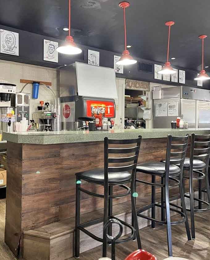 The counter offers front-row seats to the culinary magic happening just beyond that kitchen window right there.