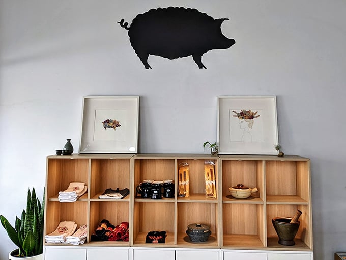 That pig silhouette on the wall watches over merchandise and condiments like a delicious guardian angel.