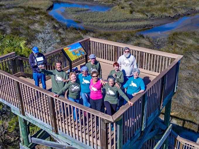 The observation tower offers views that make the climb worthwhile, revealing marshlands stretching toward forever.