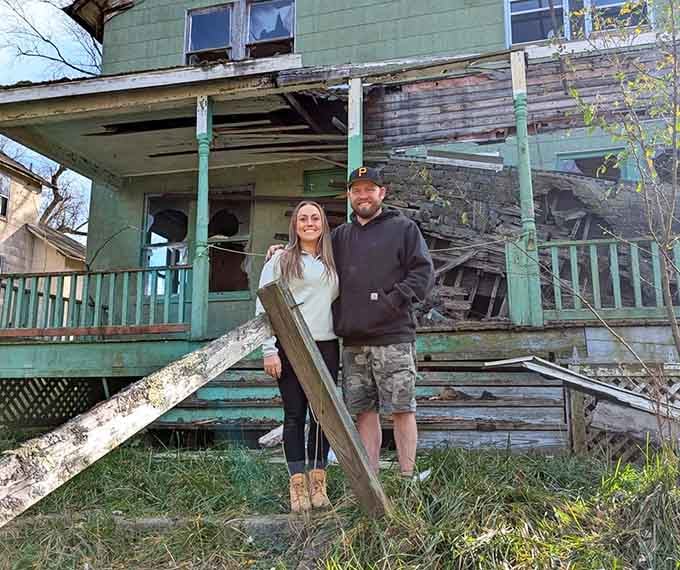Brave souls exploring the ruins, probably wondering if their life insurance policies cover "creepy ghost town misadventures" or not.